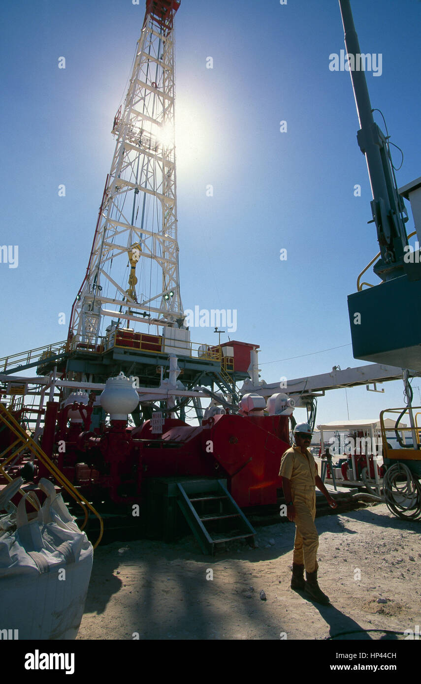 Drilling for oil in the Saudi desert near Abqaiq, by the Arabian ...
