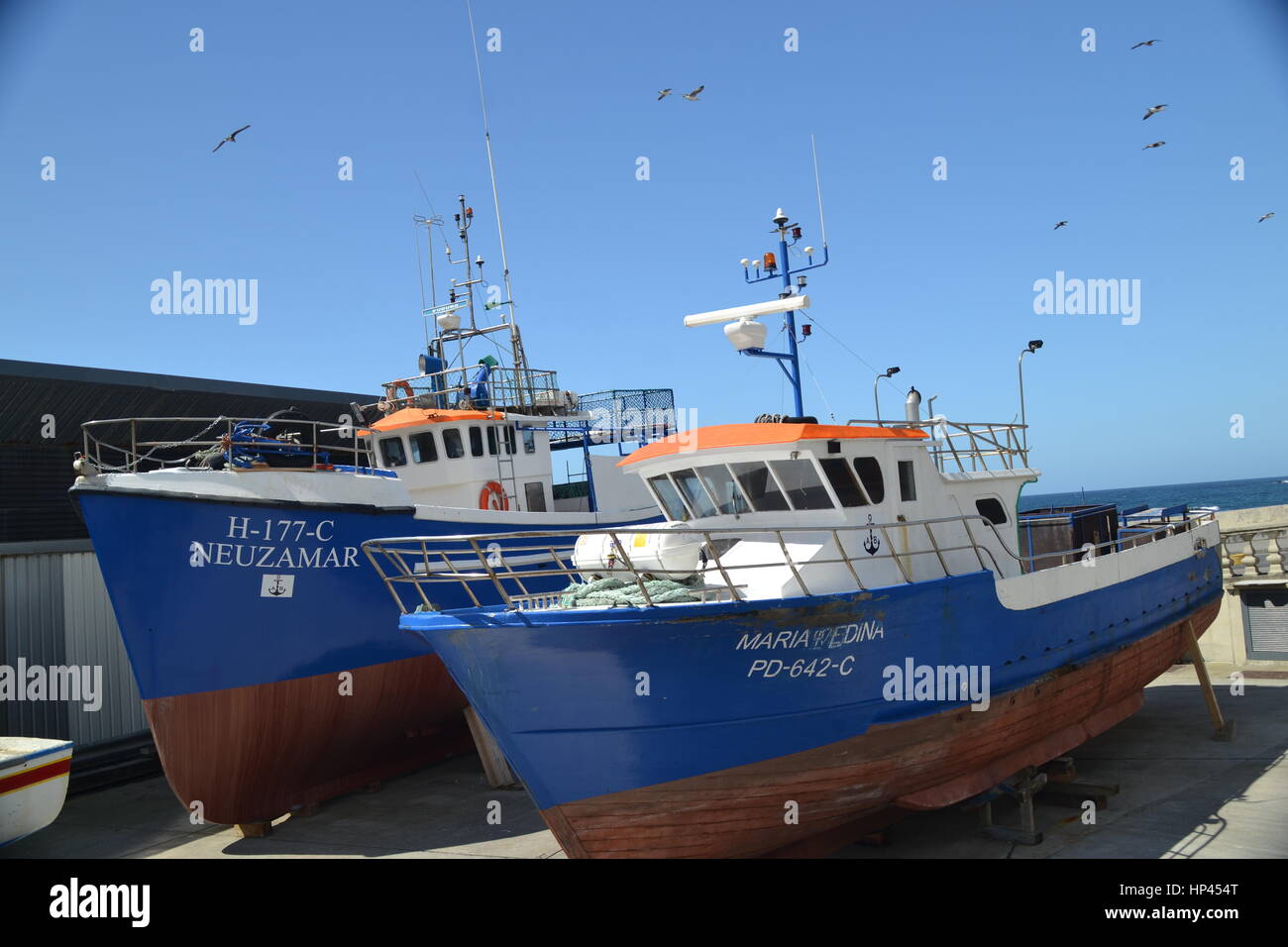 Nice motor boat ashore at marine, Sao Miguel island, Azores archipelago ...