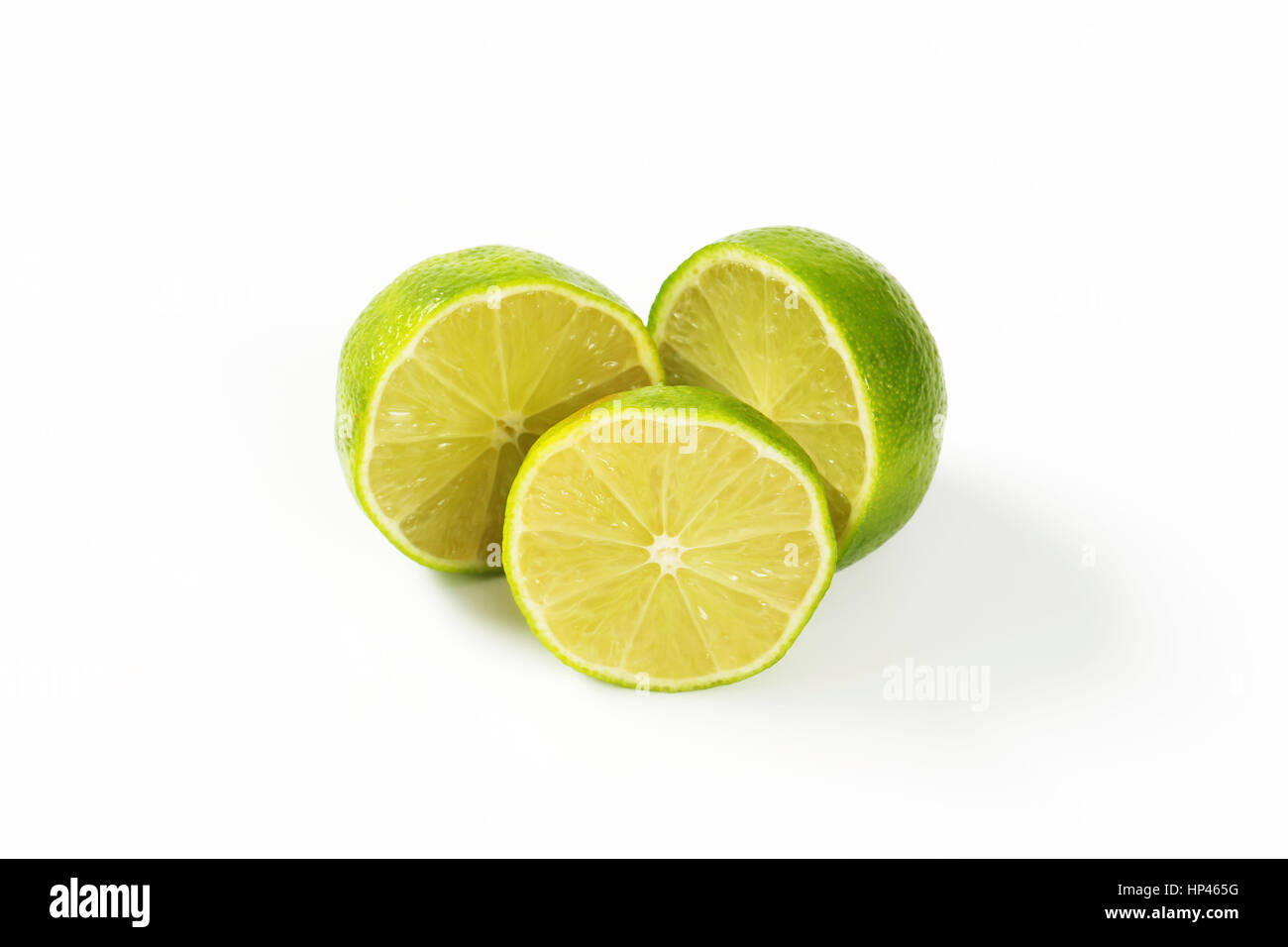 halved fresh lime on white background Stock Photo - Alamy