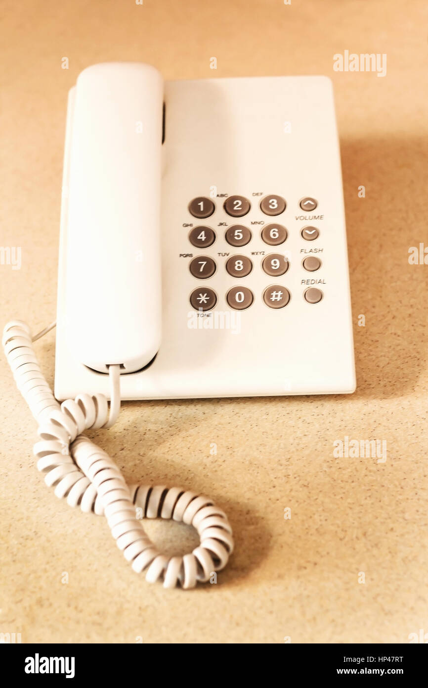 white wired phone buttons, top view Stock Photo - Alamy