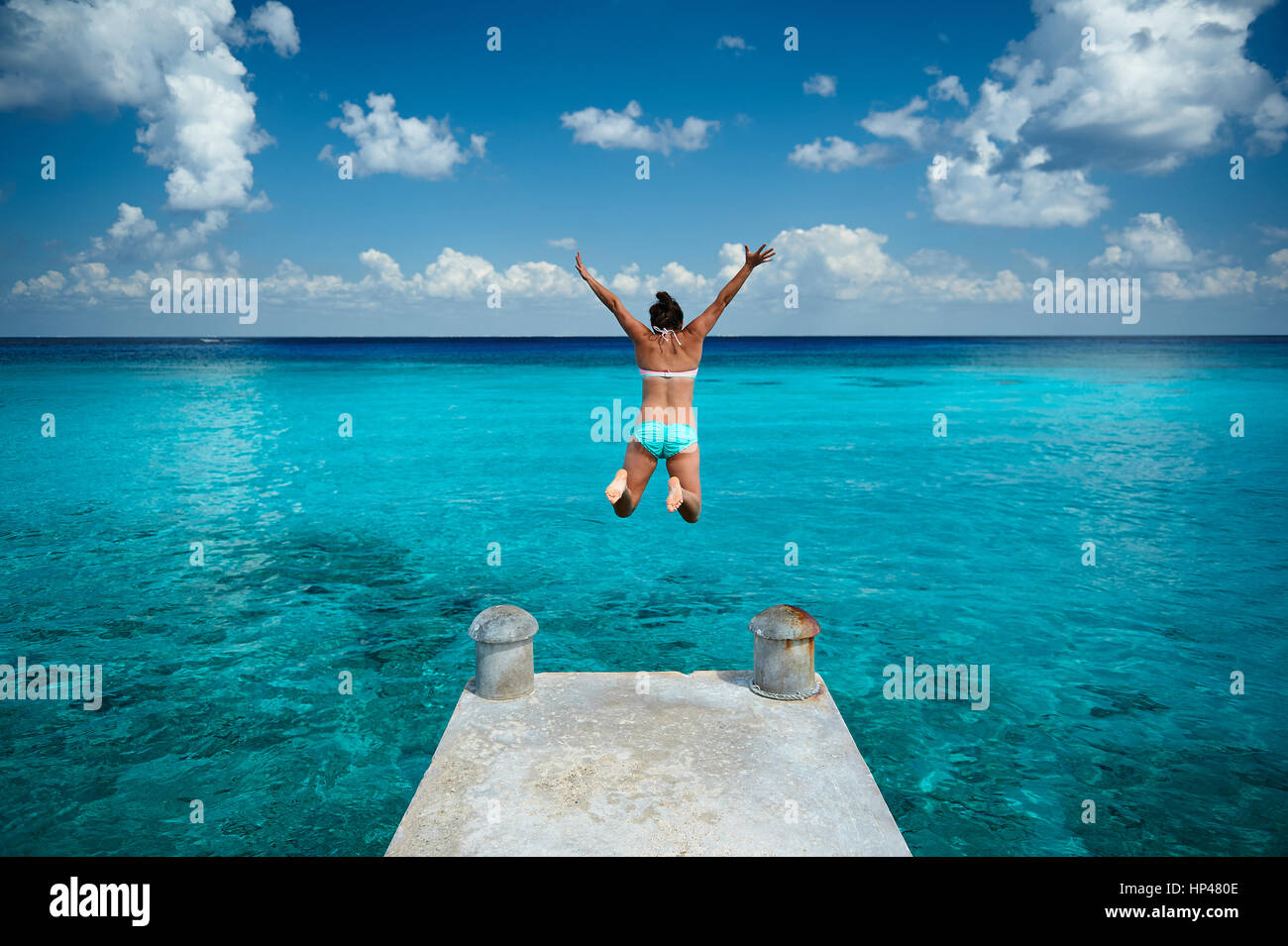 Healthy woman jumping hi-res stock photography and images - Alamy