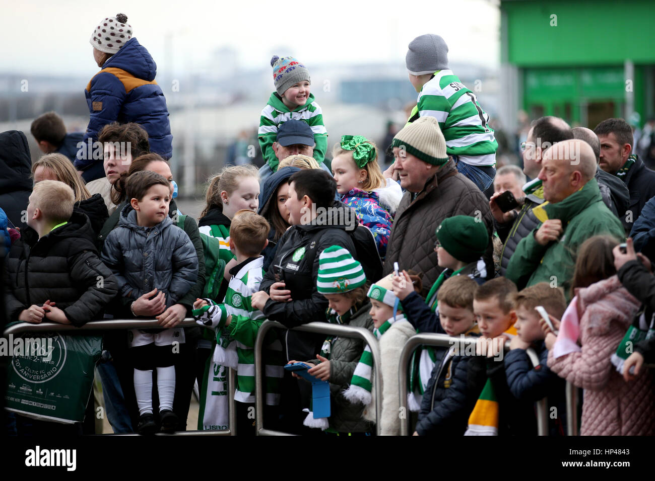 Celtic fans wait for the team bus to arrive outside the stadium ahead ...