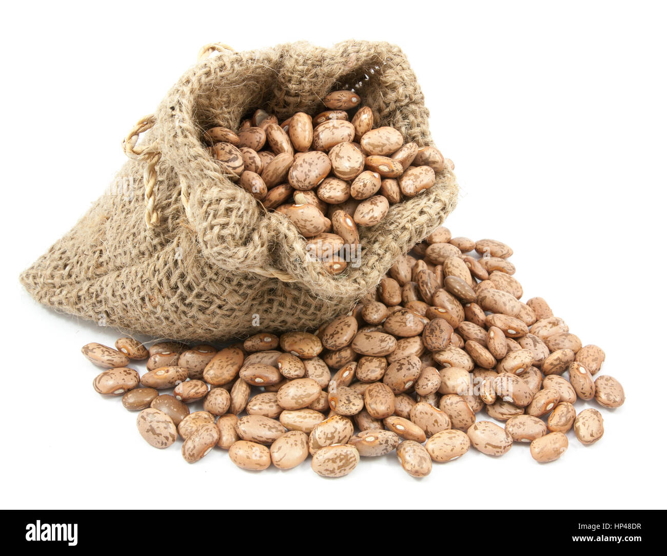 pinto beans in canvas sack on white background Stock Photo - Alamy
