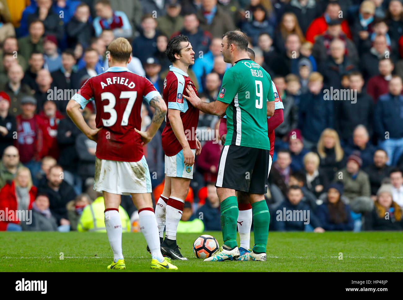 Burnley's Joey Barton (left) and Lincoln City's Matt Rhead argue during ...