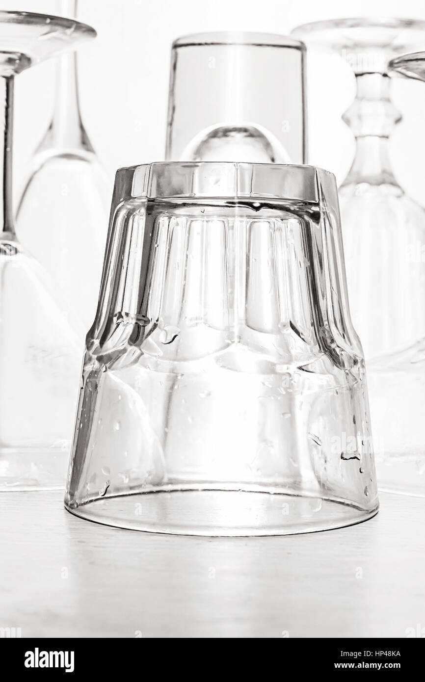 Glass goblets of different shapes on a white background Stock Photo - Alamy