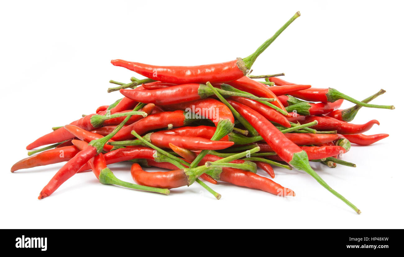 red chili peppers closeup view isolated white background Stock Photo ...