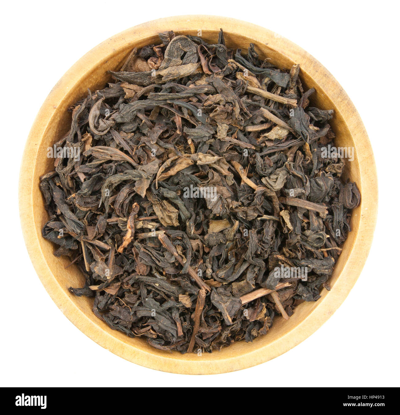 tea in a wood bowl isolated on white background Stock Photo - Alamy