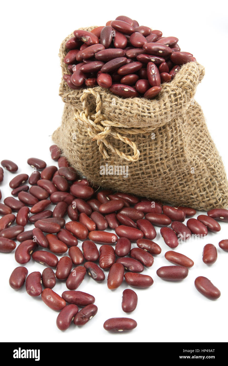 red beans in canvas sack on white background Stock Photo - Alamy