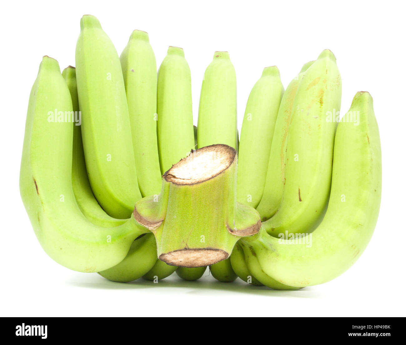 bunch of green bananas on white background Stock Photo - Alamy