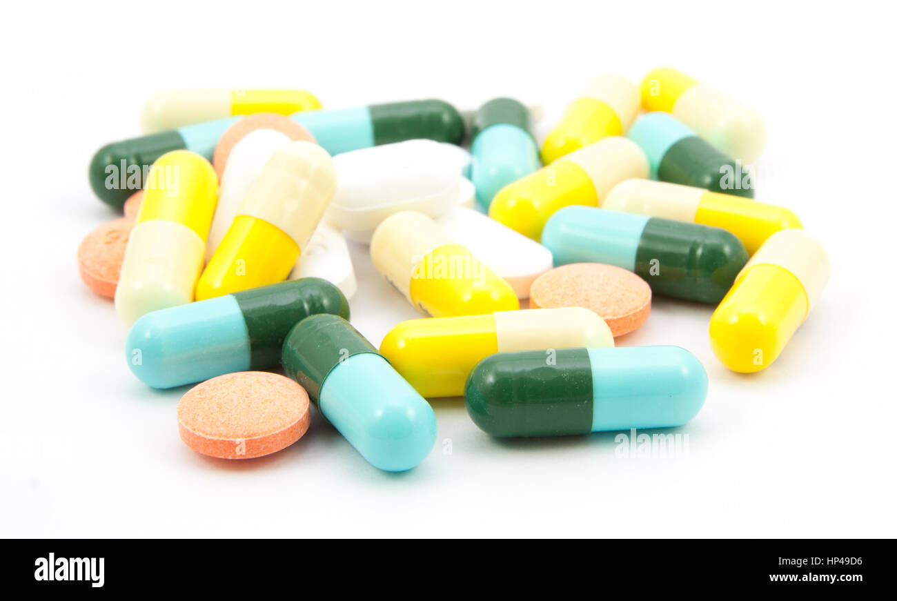 many pills and tablets isolated on white background Stock Photo - Alamy
