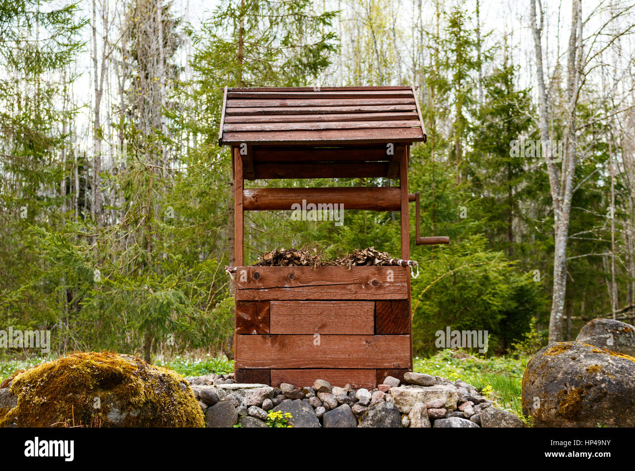 Brick water well wooden roof hi-res stock photography and images - Alamy