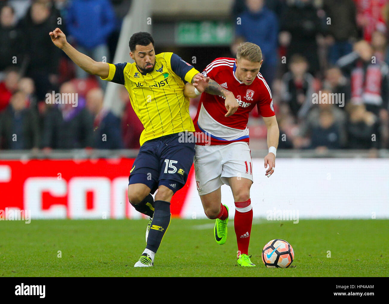 Oxford United's Kane Hemmings (left) and Middlesbrough's Viktor Fischer ...