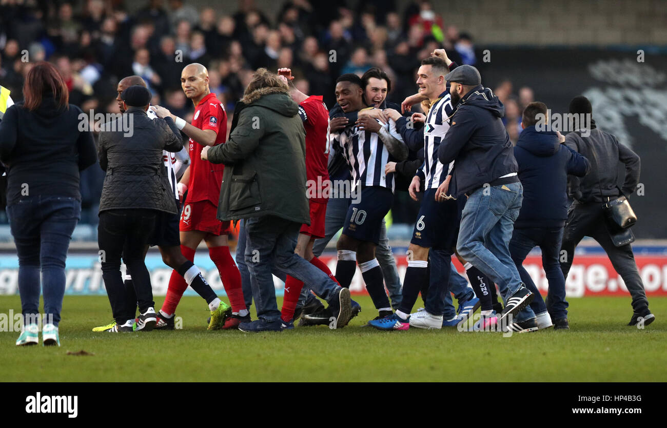 Millwall fans invade the pitch and celebrate with players after the ...