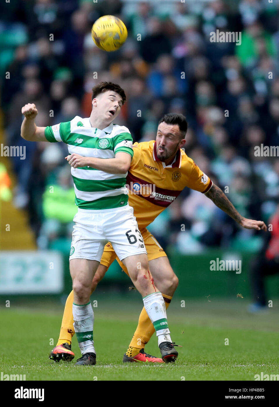 Celtic's Kieran Tierney and Motherwell's Scott McDonald battle for the ...