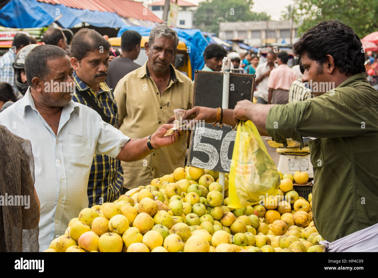 Mumbai, India -December 11, 2016 - Indian trader in his shop on local ...