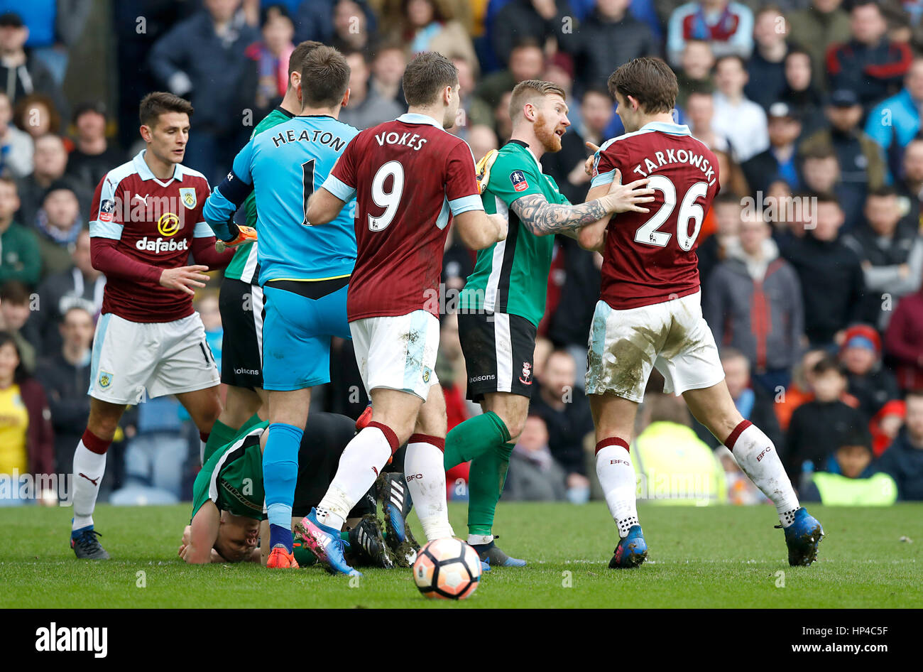 Burnley's James Tarkowski and Lincoln City's Alan Powder argue Stock ...