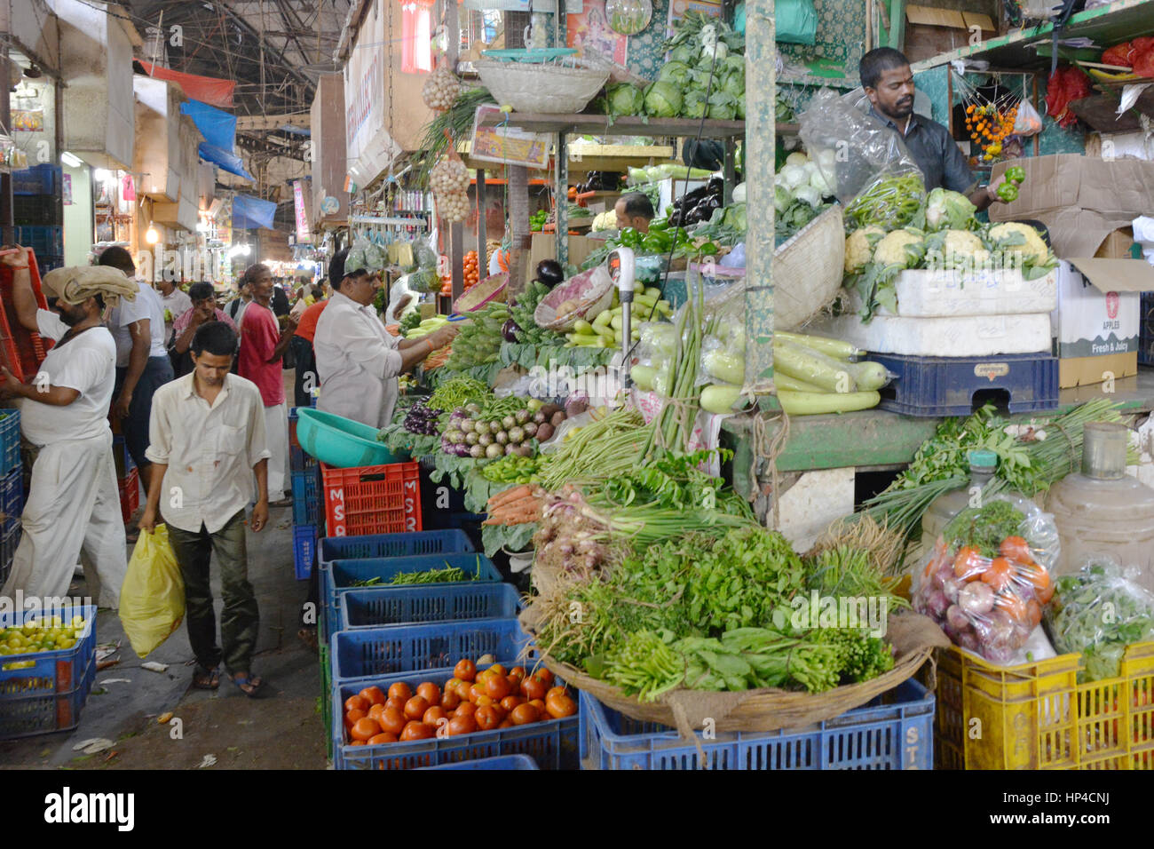Mumbai, India - October 19, 2015 - Indian trader in his shop on local ...