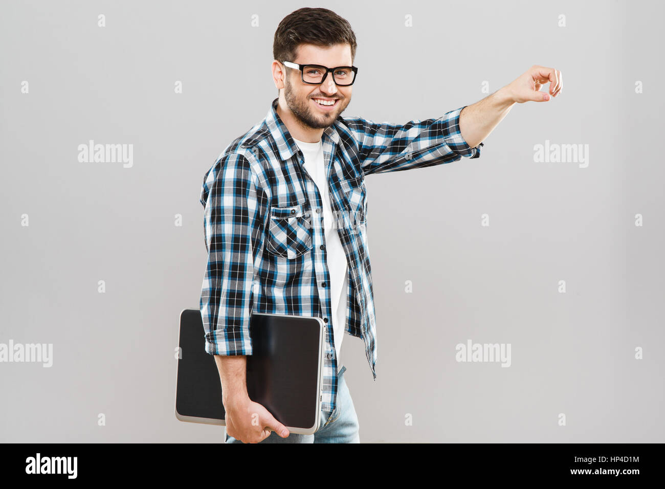 Man holding hand aside with fingers in round shape Stock Photo - Alamy