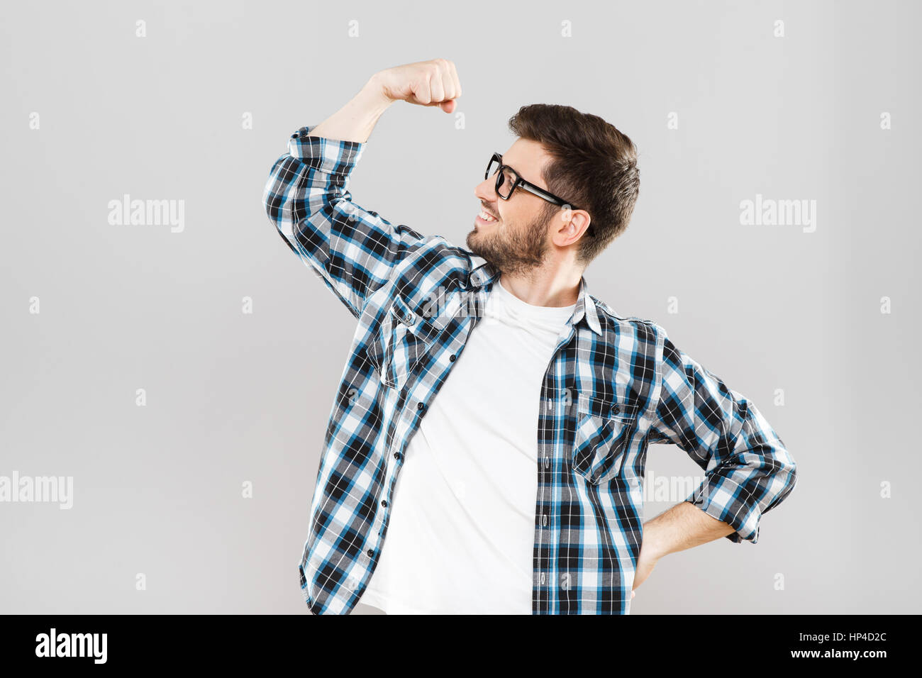 Man showing strength Stock Photo - Alamy