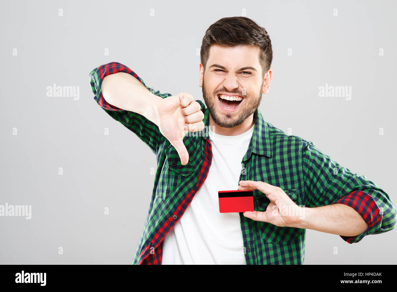 Man showing thumbs down Stock Photo - Alamy