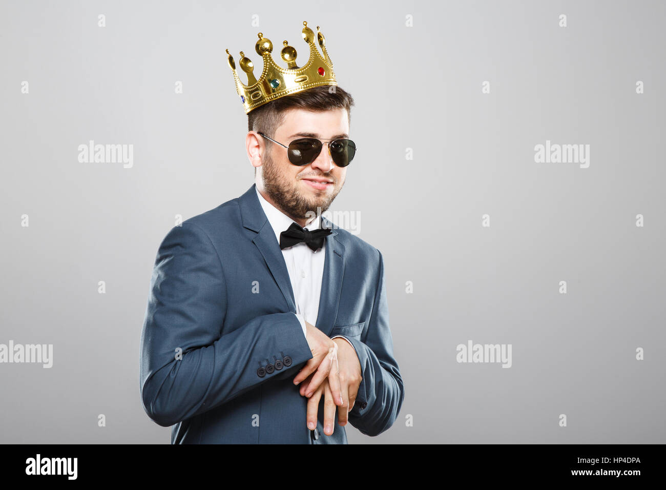Funny man in crown Stock Photo - Alamy