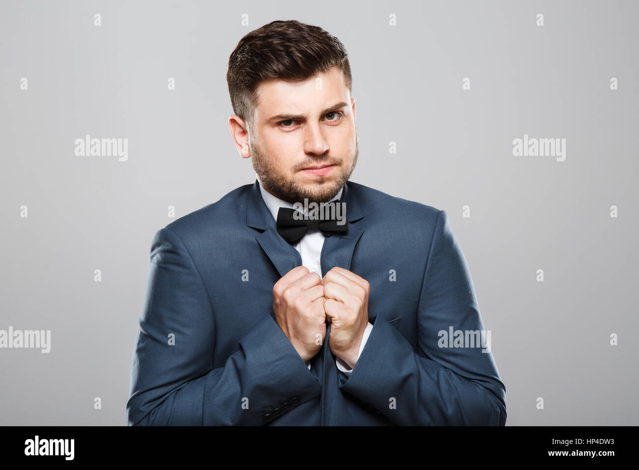Serious man in suit Stock Photo - Alamy