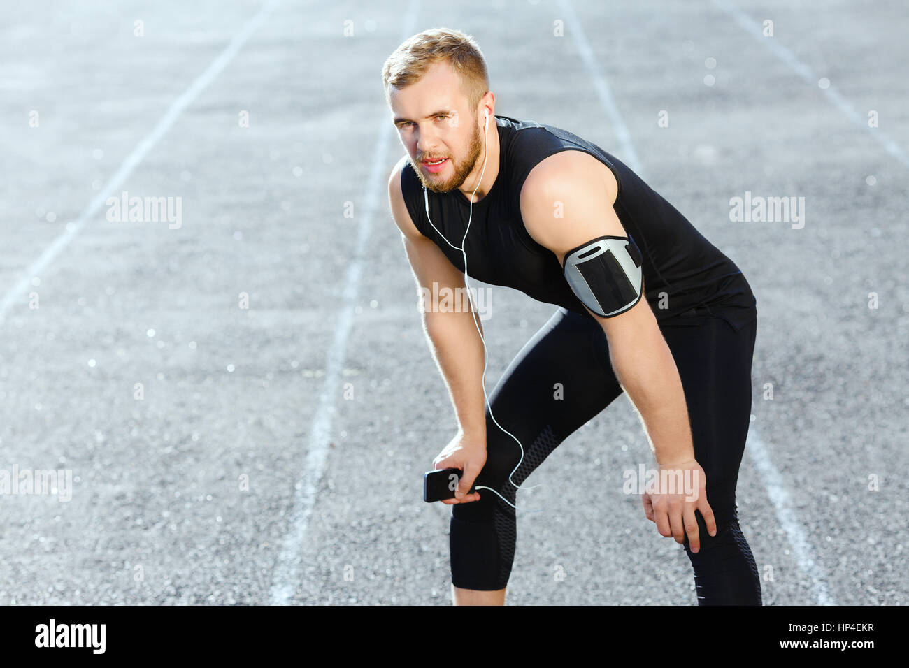 Man bending ahead Stock Photo - Alamy
