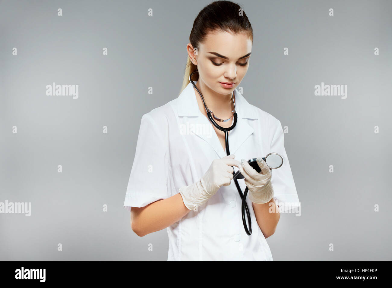 Female doctor in white medical robe Stock Photo - Alamy