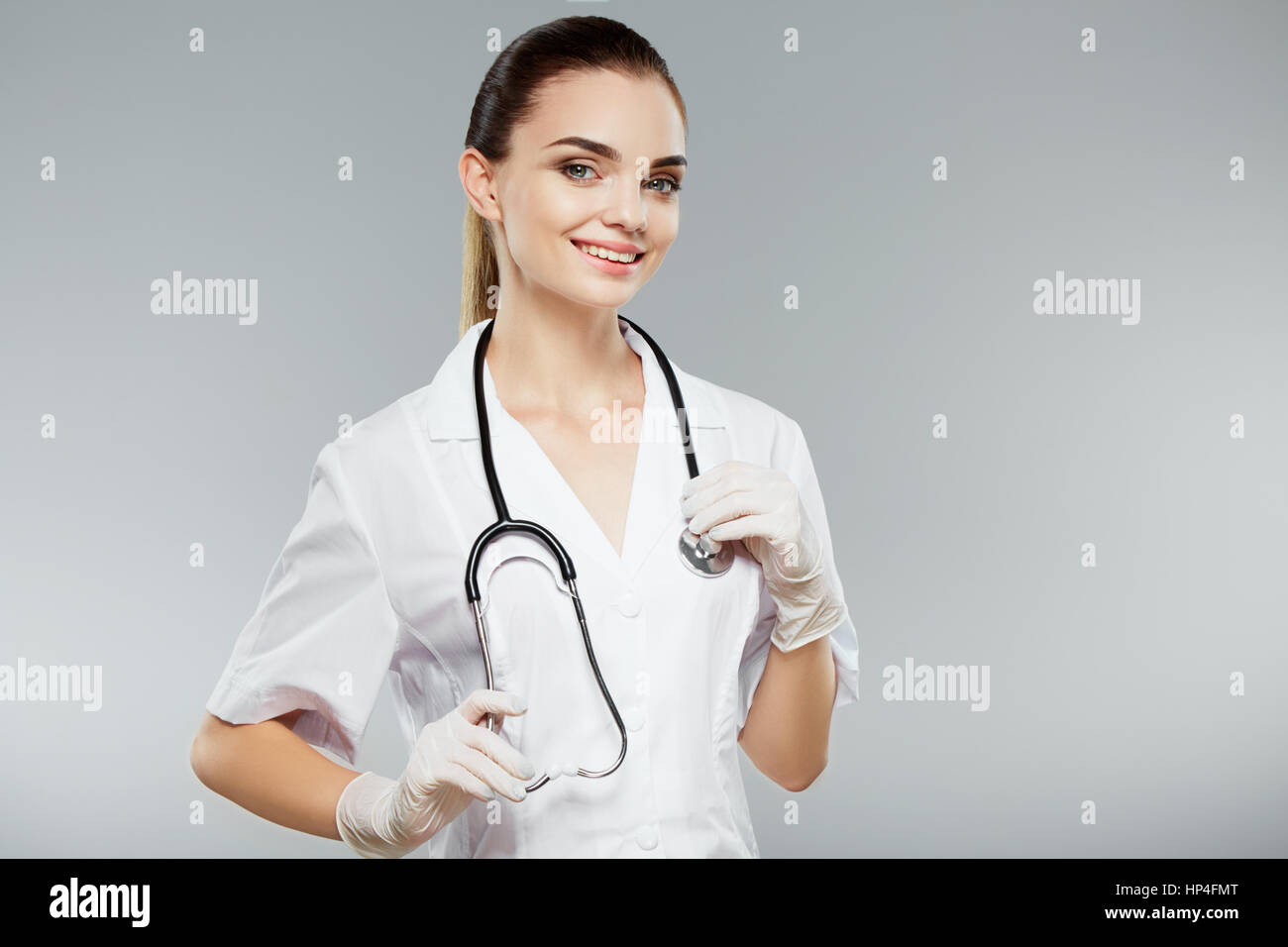 Female doctor in white medical robe Stock Photo - Alamy