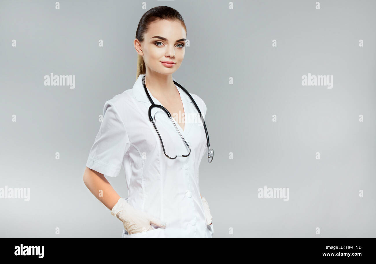 Female doctor in white medical robe Stock Photo - Alamy