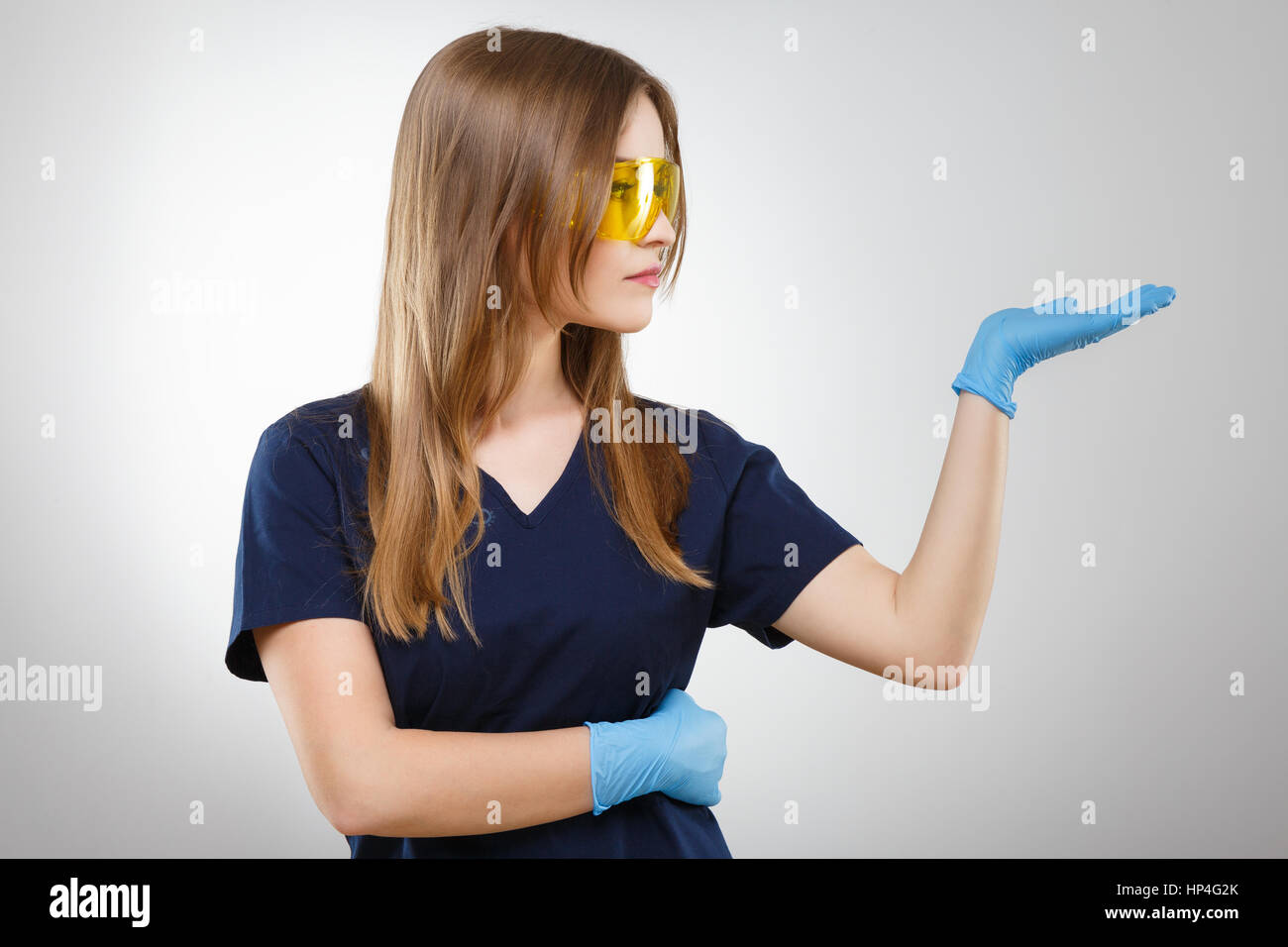 Beautiful nurse in blue medical uniform Stock Photo - Alamy