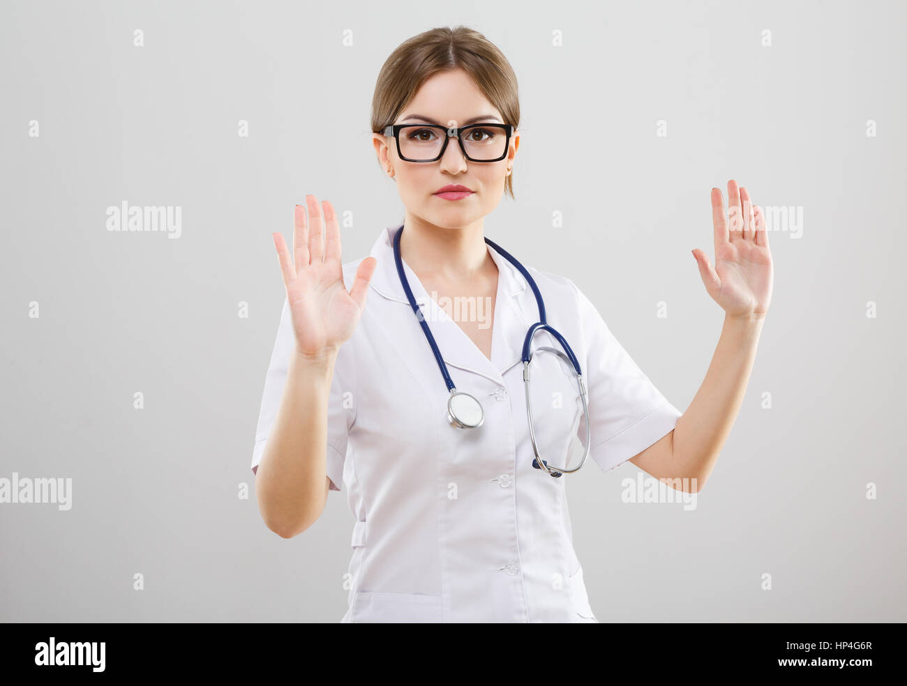 Beautiful nurse in white medical robe Stock Photo - Alamy