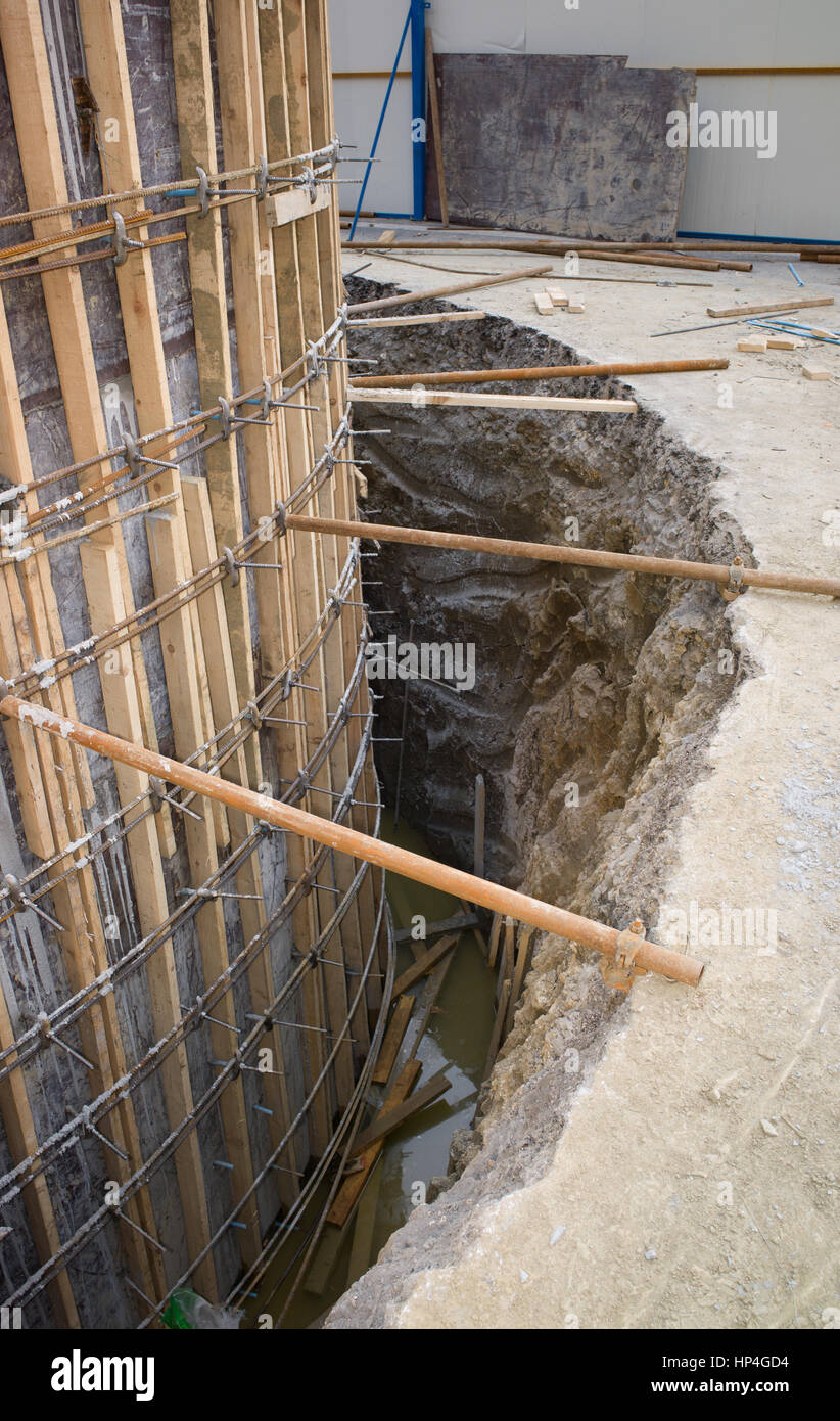 Reinforced concrete shaft under construction for access to drainage ...