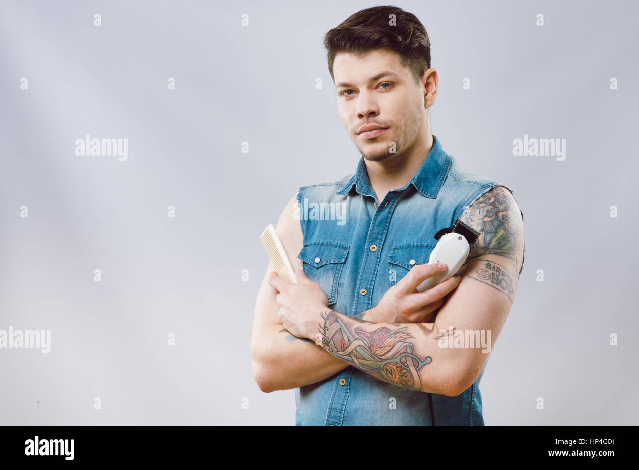 Attractive barber portrait Stock Photo - Alamy