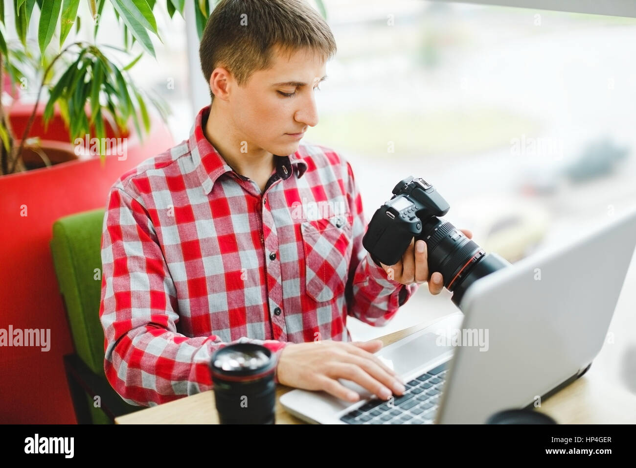 Handsome man working with laptop Stock Photo - Alamy