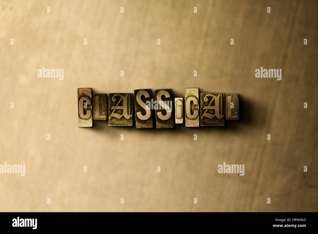 CLASSICAL - close-up of grungy vintage typeset word on metal backdrop ...