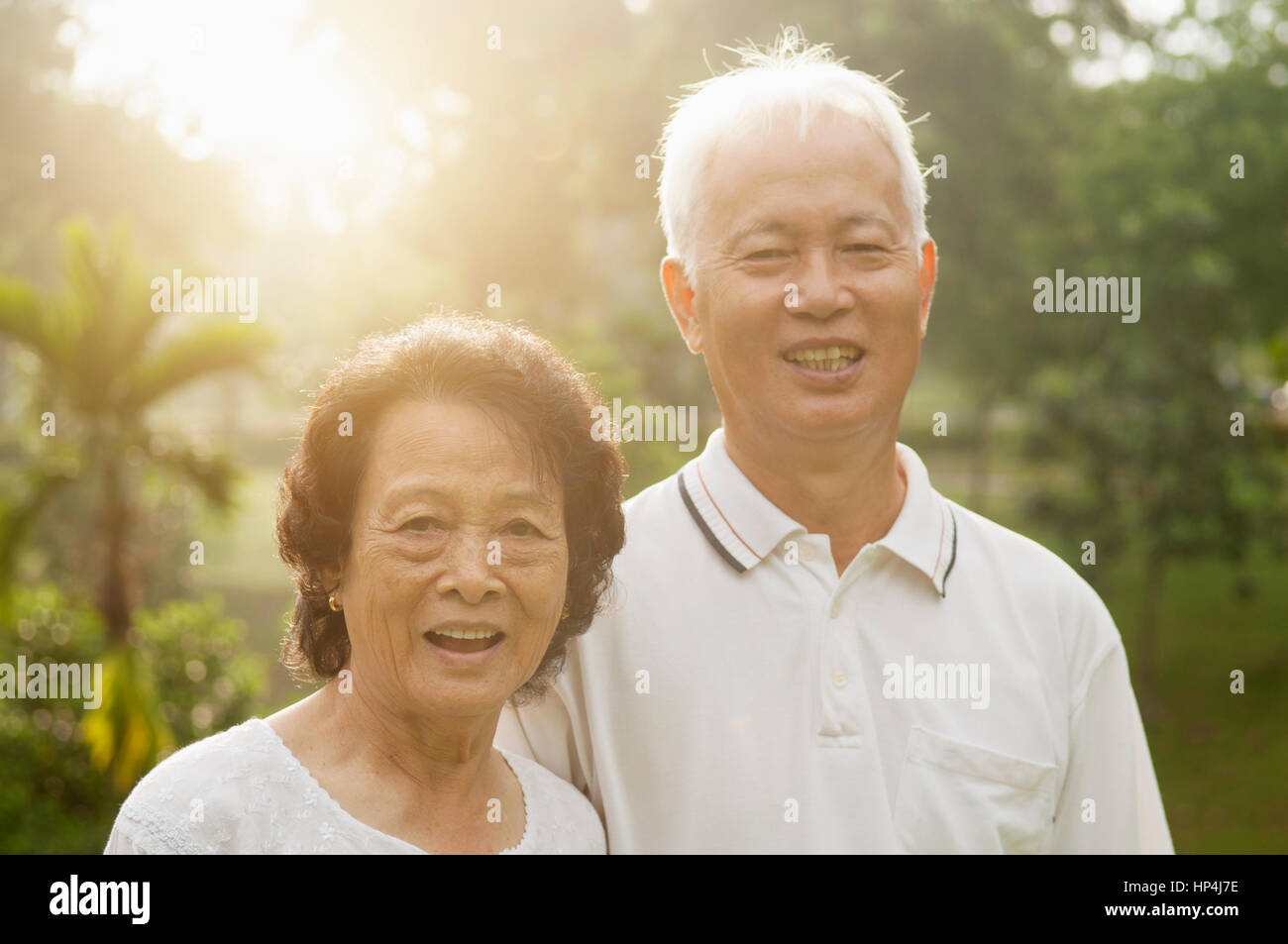 Portrait of healthy and happy Asian seniors retiree couple enjoying ...