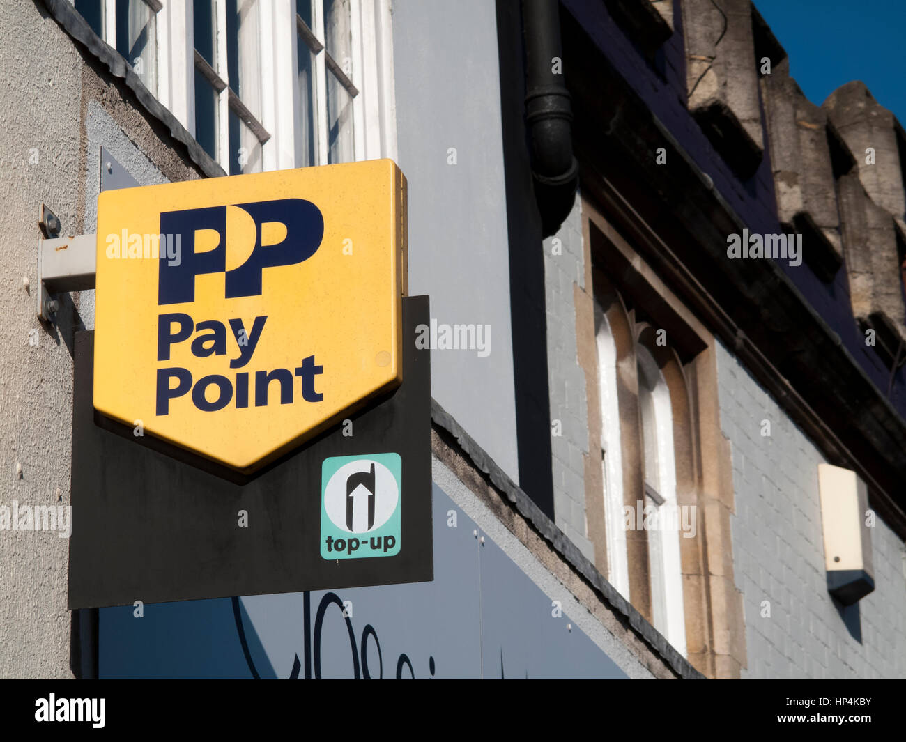 PP Pay Point and mobile phone top up facility sign over retail premises ...