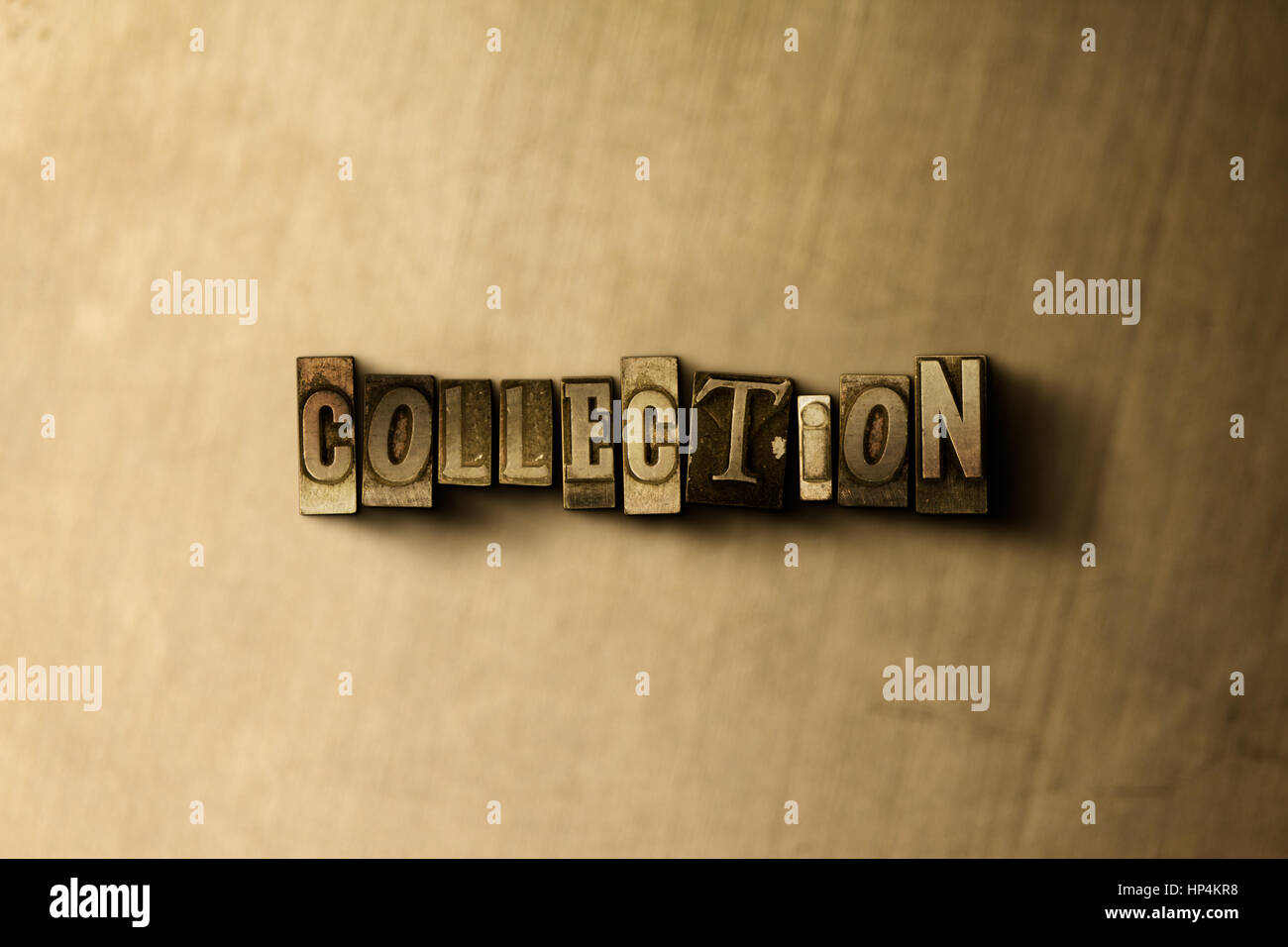 COLLECTION - close-up of grungy vintage typeset word on metal backdrop ...