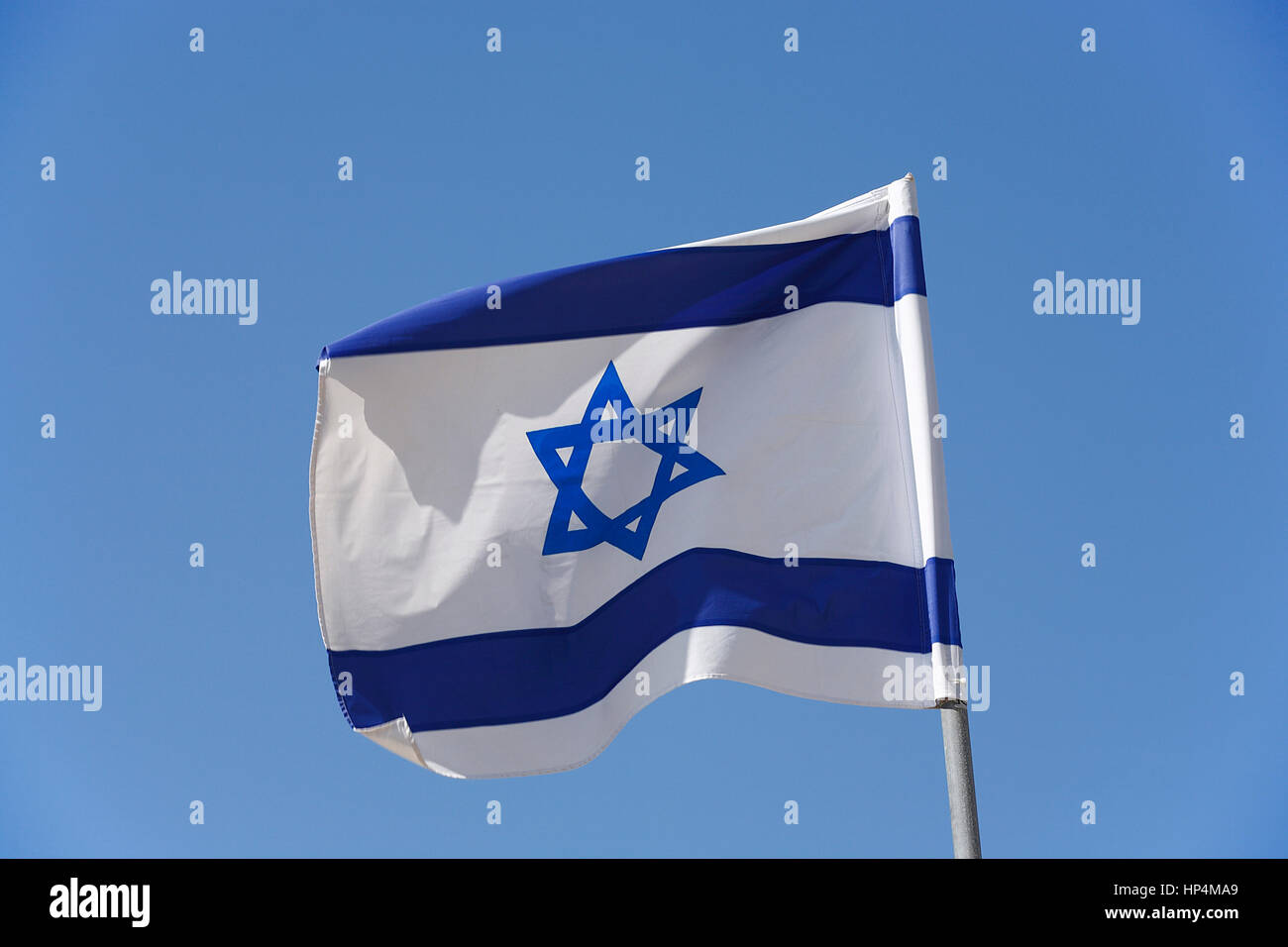 flag of israel blowing in the wind, tel aviv, israel Stock Photo - Alamy