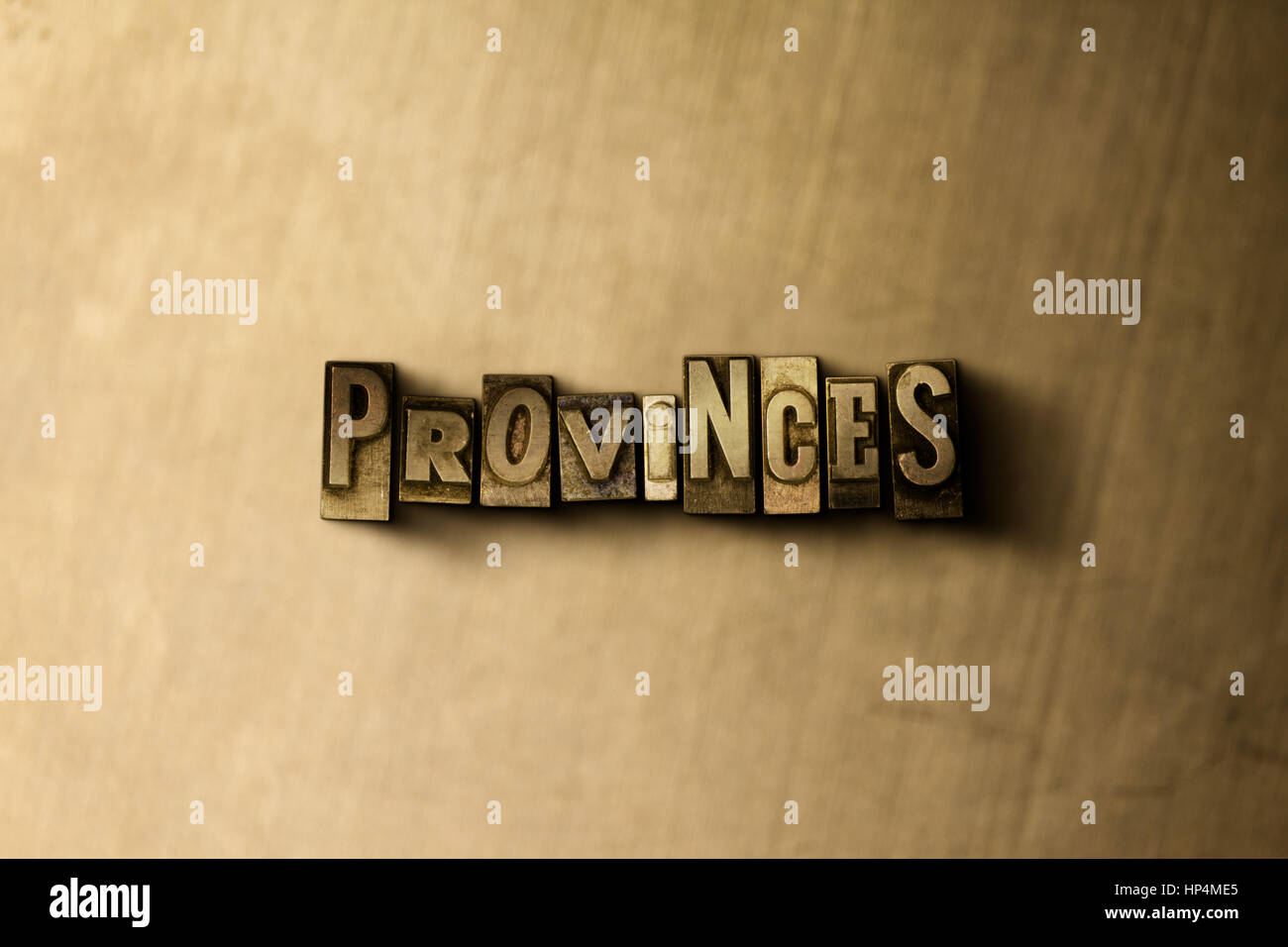 PROVINCES - close-up of grungy vintage typeset word on metal backdrop ...