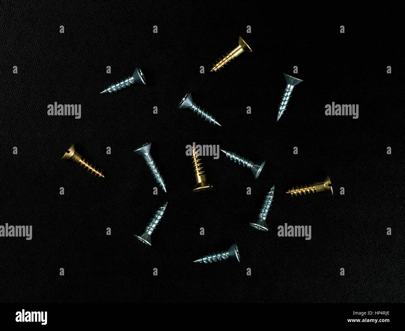 Household Steel Screws or Fixings Against a Black Background Stock ...