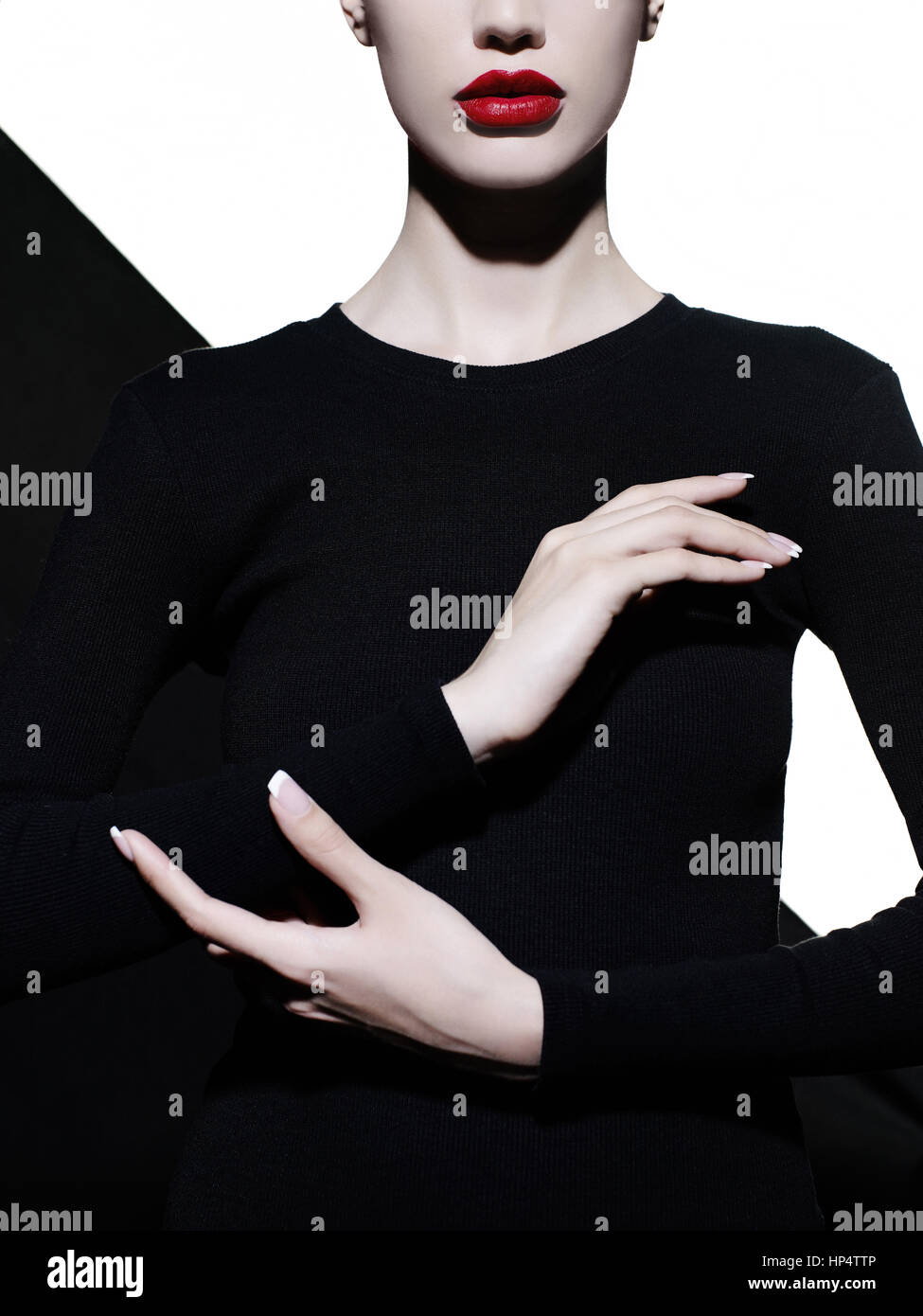 Fashion art studio portrait of elegant blode in geometric black and ...