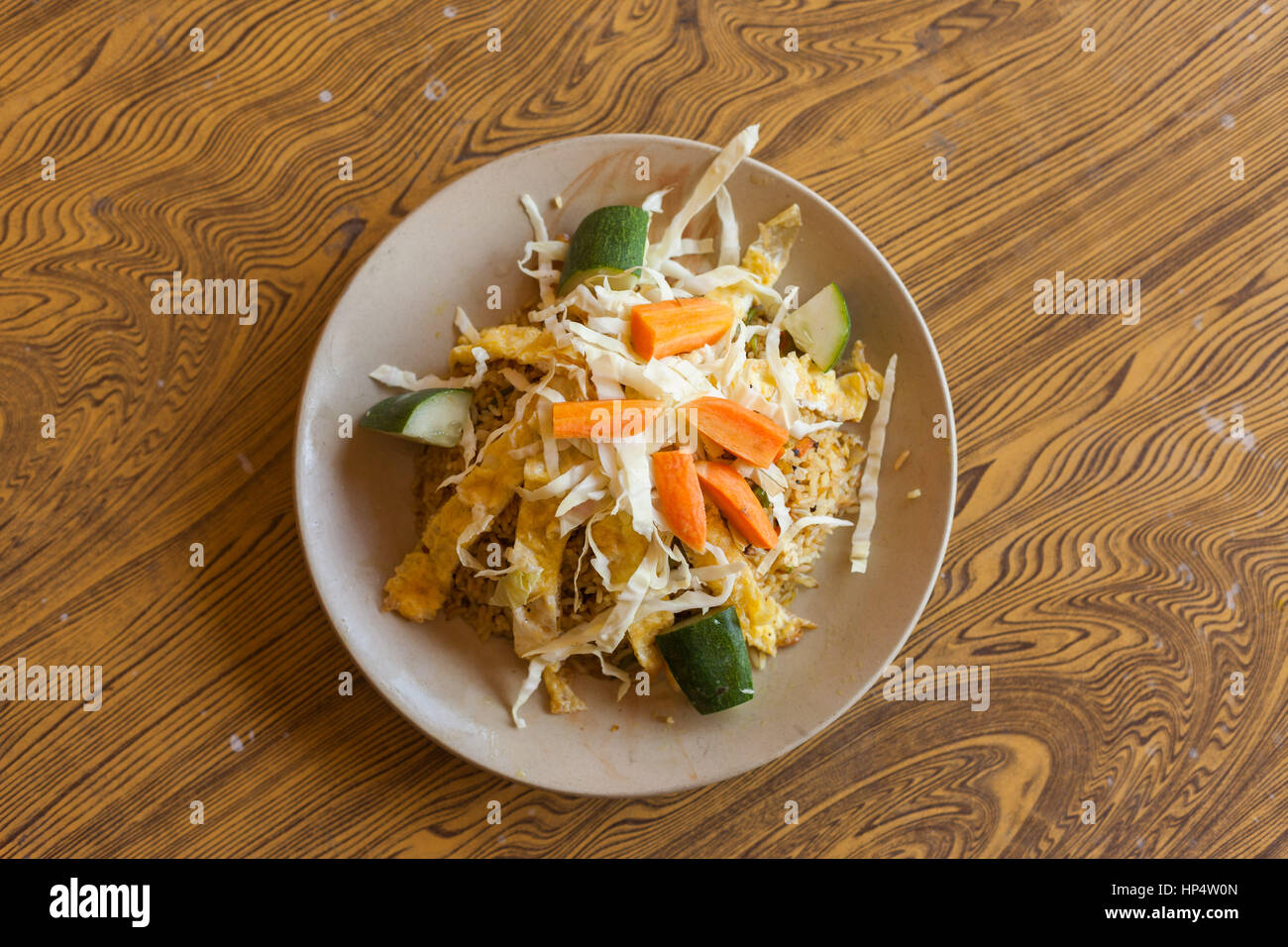 Traditional egg fried rice with vegetables in Nepal Stock Photo - Alamy