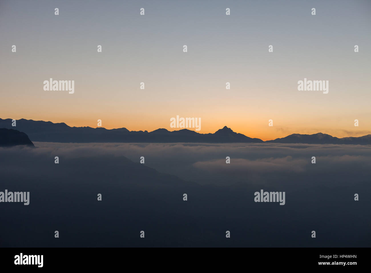 Morning inversion layer over Kangchenjunga Himal, eastern Nepal Stock ...