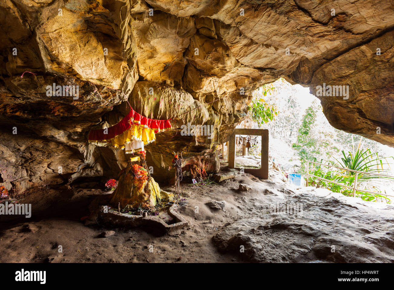 Shiva shrine in the entrace to Siddha Cave (Gufa), said to be the ...