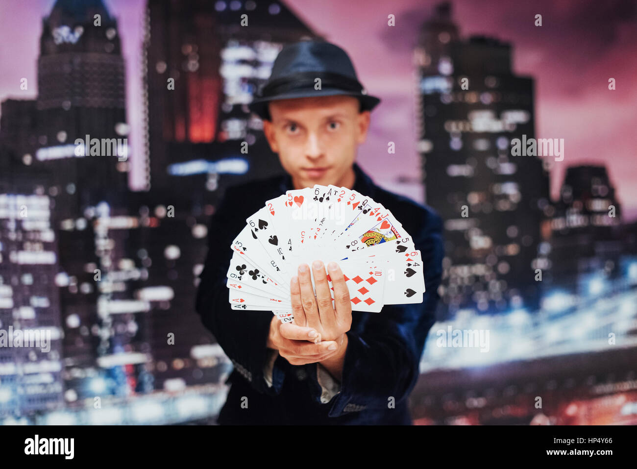 Magician showing trick with playing cards. Magic, circus Stock Photo ...