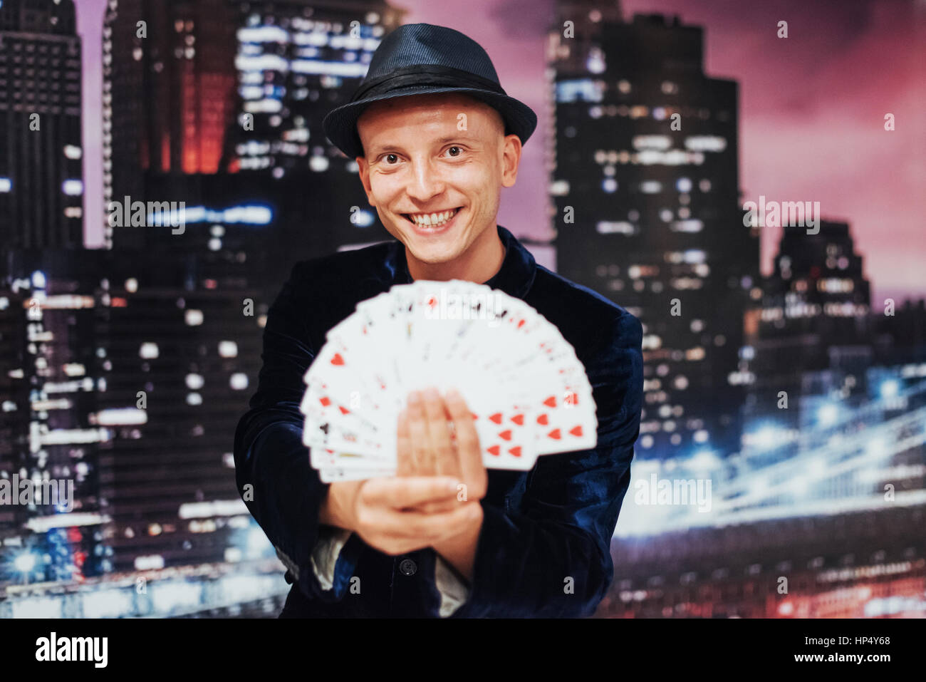 Magician showing trick with playing cards. Magic, circus Stock Photo ...