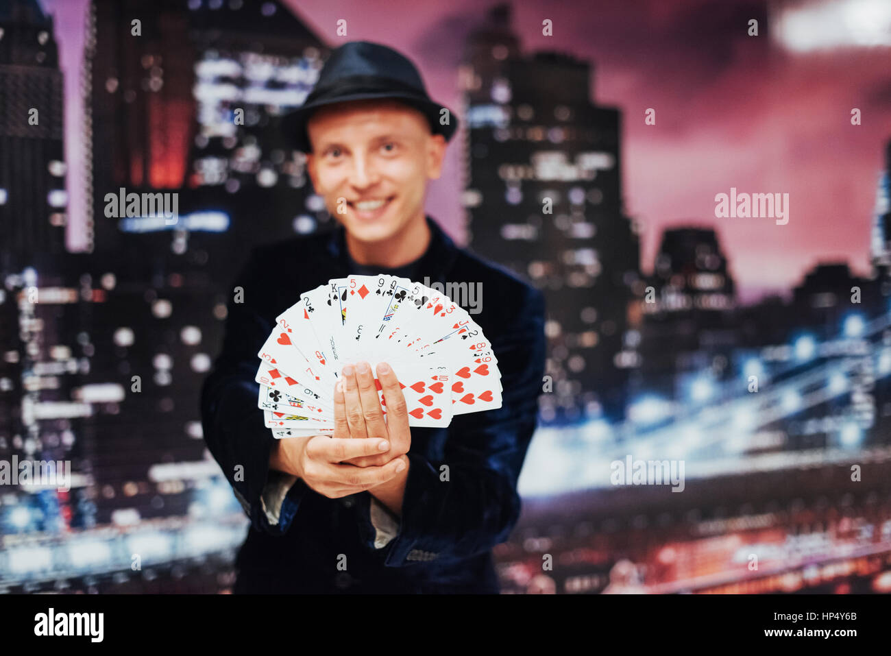 Magician showing trick with playing cards. Magic, circus Stock Photo ...