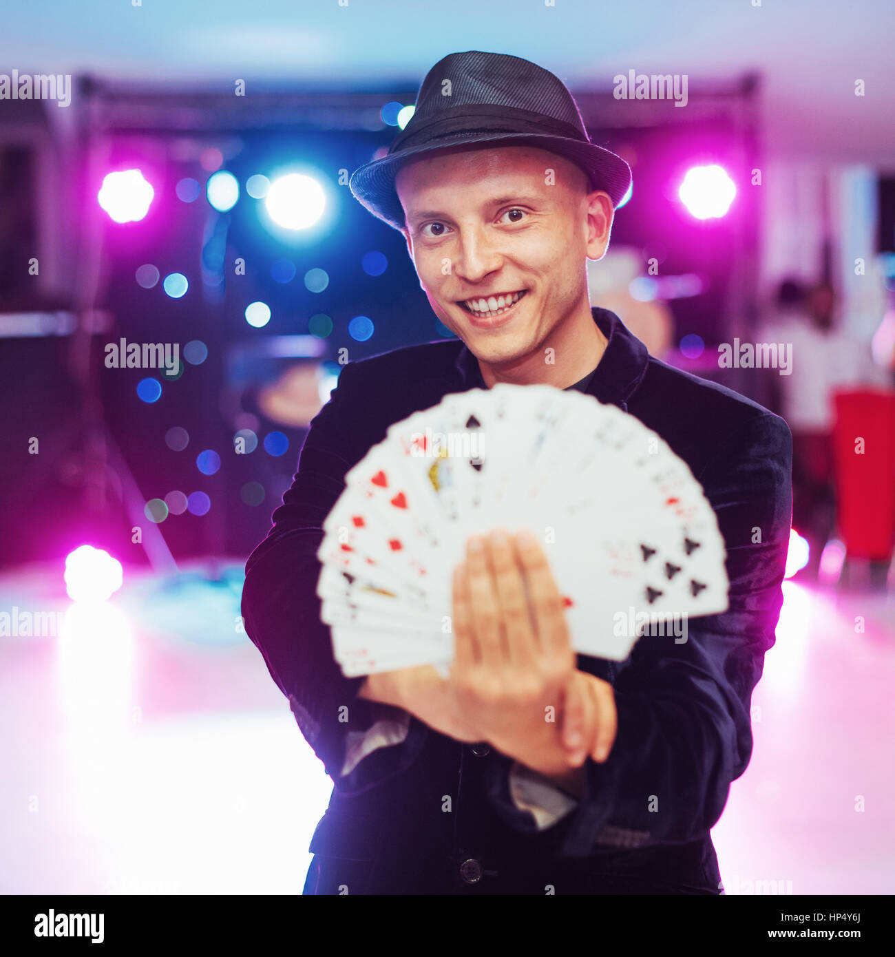 Magician showing trick with playing cards. Magic, circus Stock Photo ...
